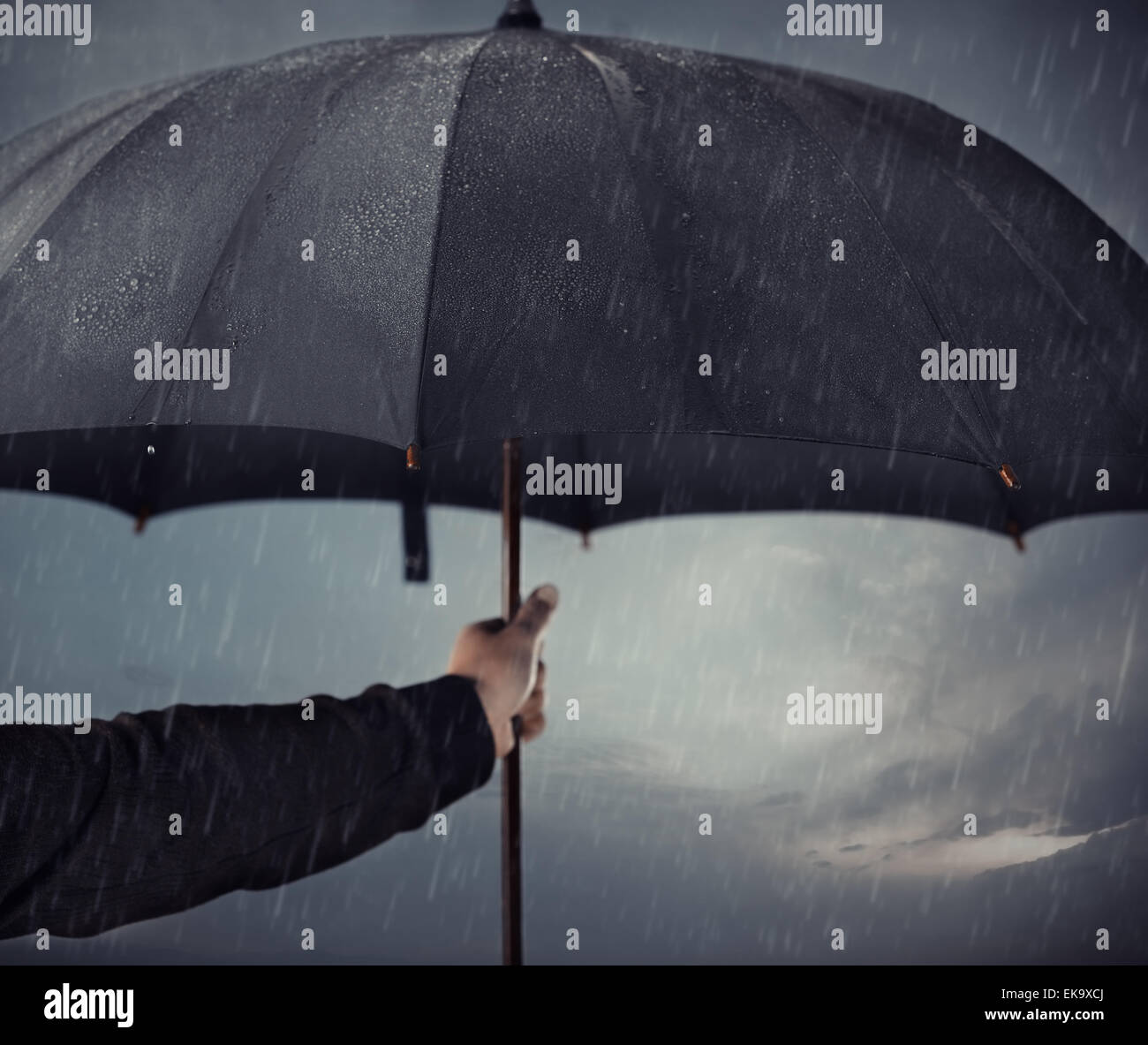 Umbrella under the rain Stock Photo - Alamy