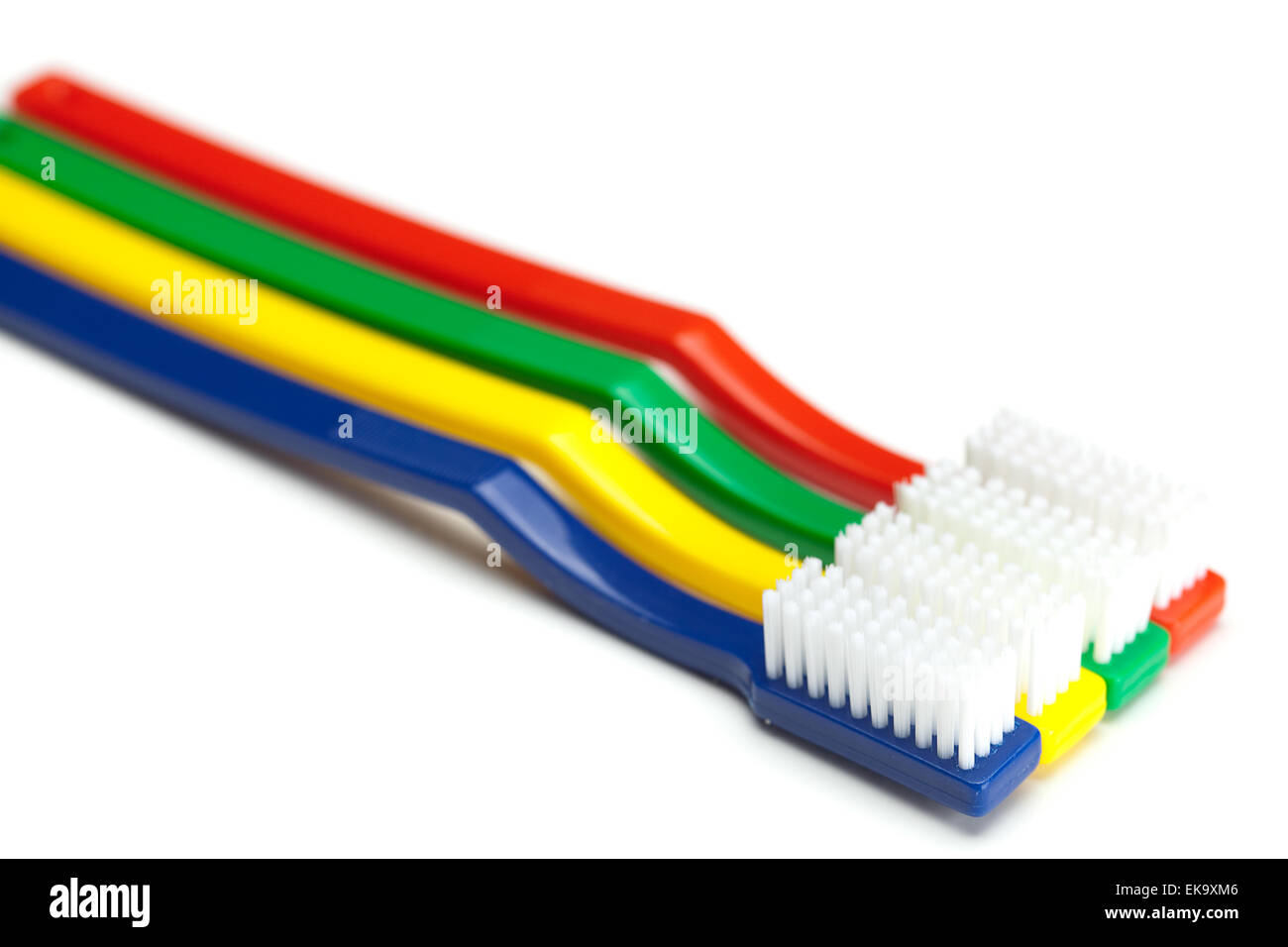 colored toothbrush isolated on white Stock Photo - Alamy