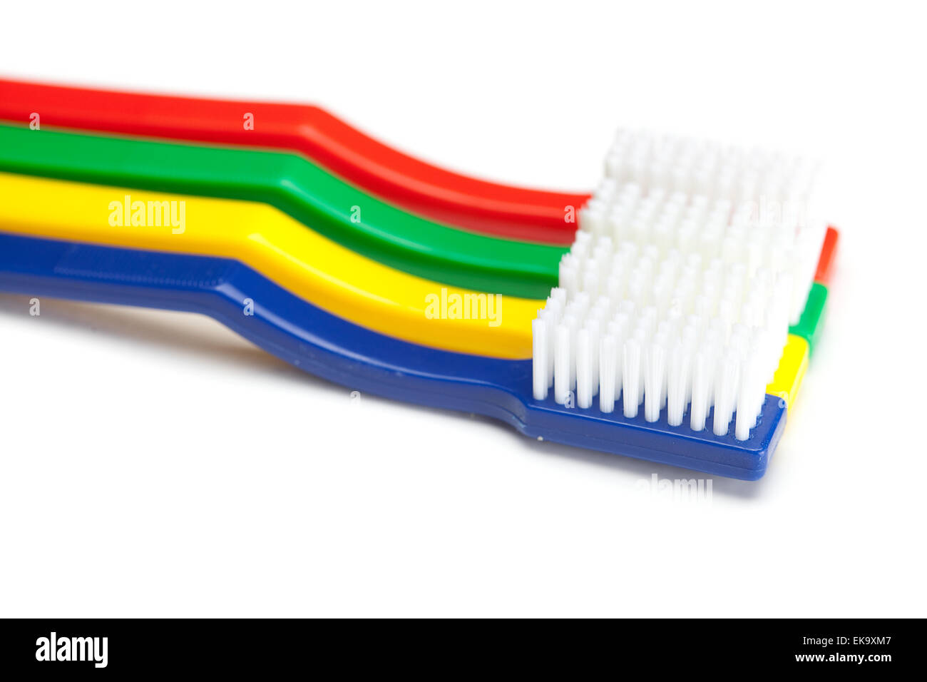 colored toothbrush isolated on white Stock Photo - Alamy