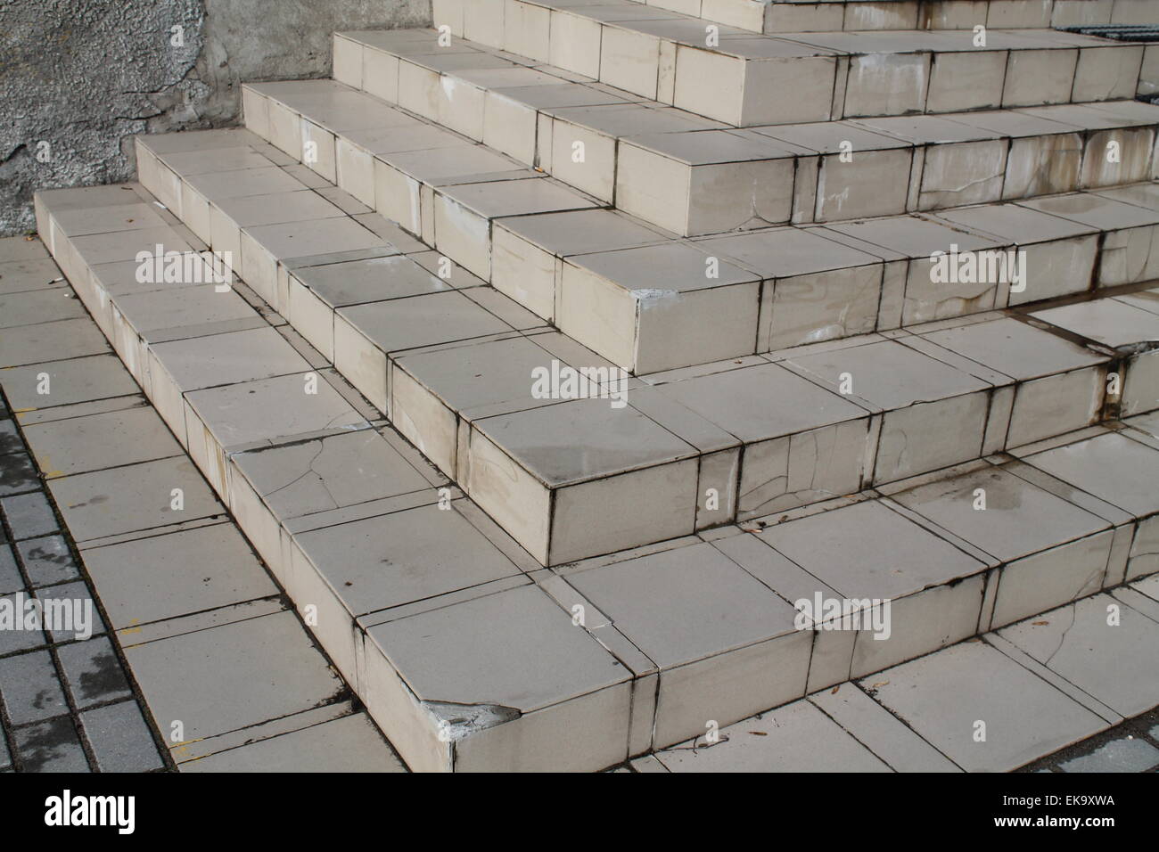 stone staircase shape like pyramid covering white tiles Stock Photo - Alamy