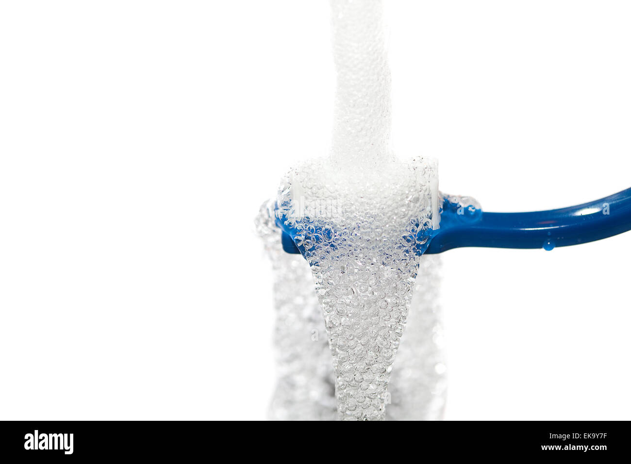 Toothbrush under running water hi-res stock photography and images - Alamy