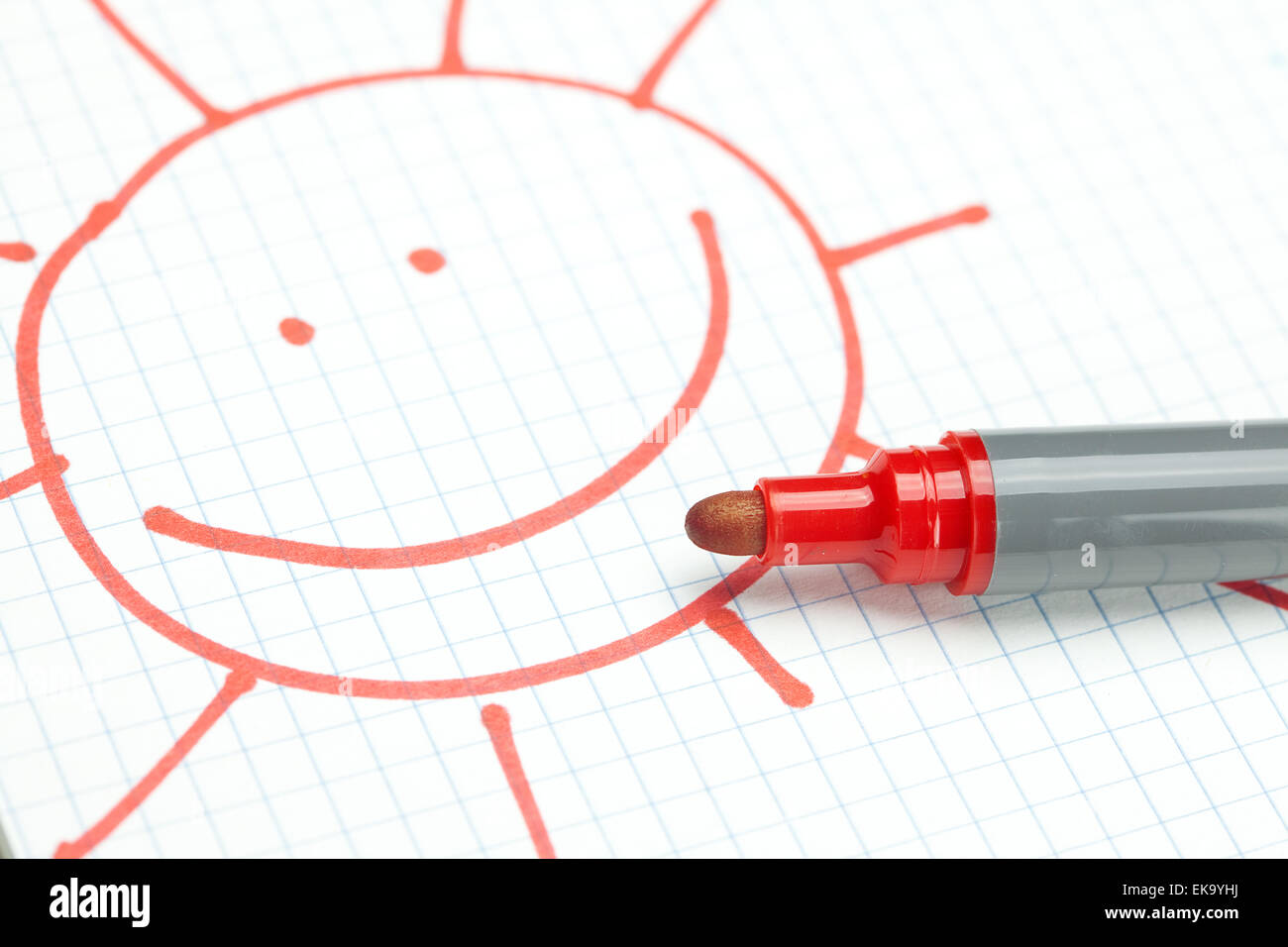 marker and painted the sun on the notebook sheet Stock Photo - Alamy