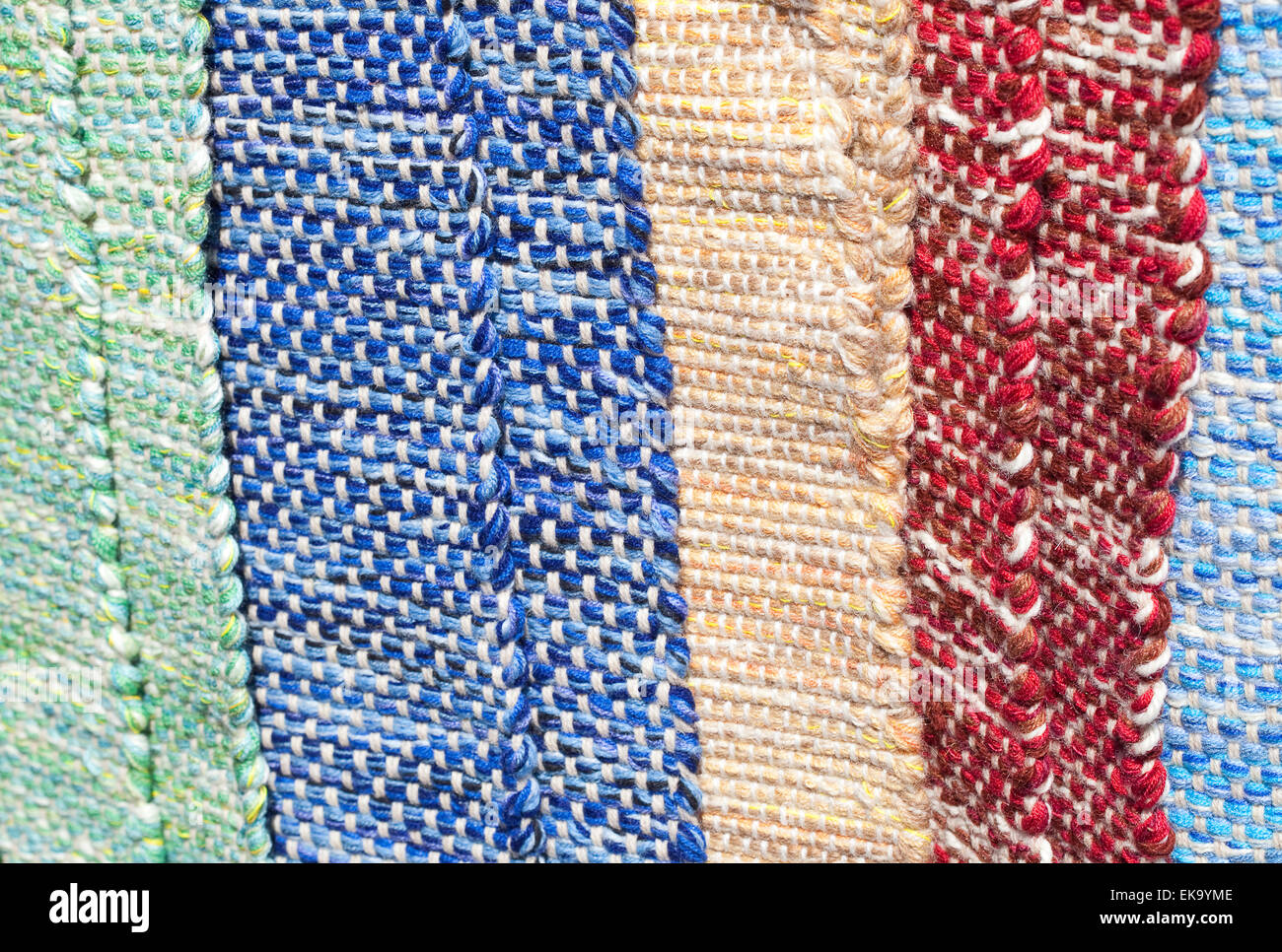 background of multi colored carpet at the fair Stock Photo - Alamy