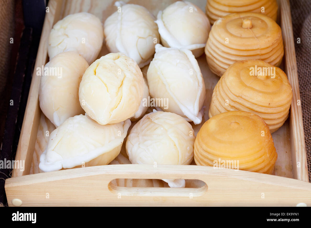background of smoked cheese at the fair Stock Photo - Alamy