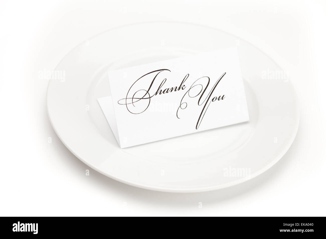 plate with card signed thank you isolated on white Stock Photo - Alamy