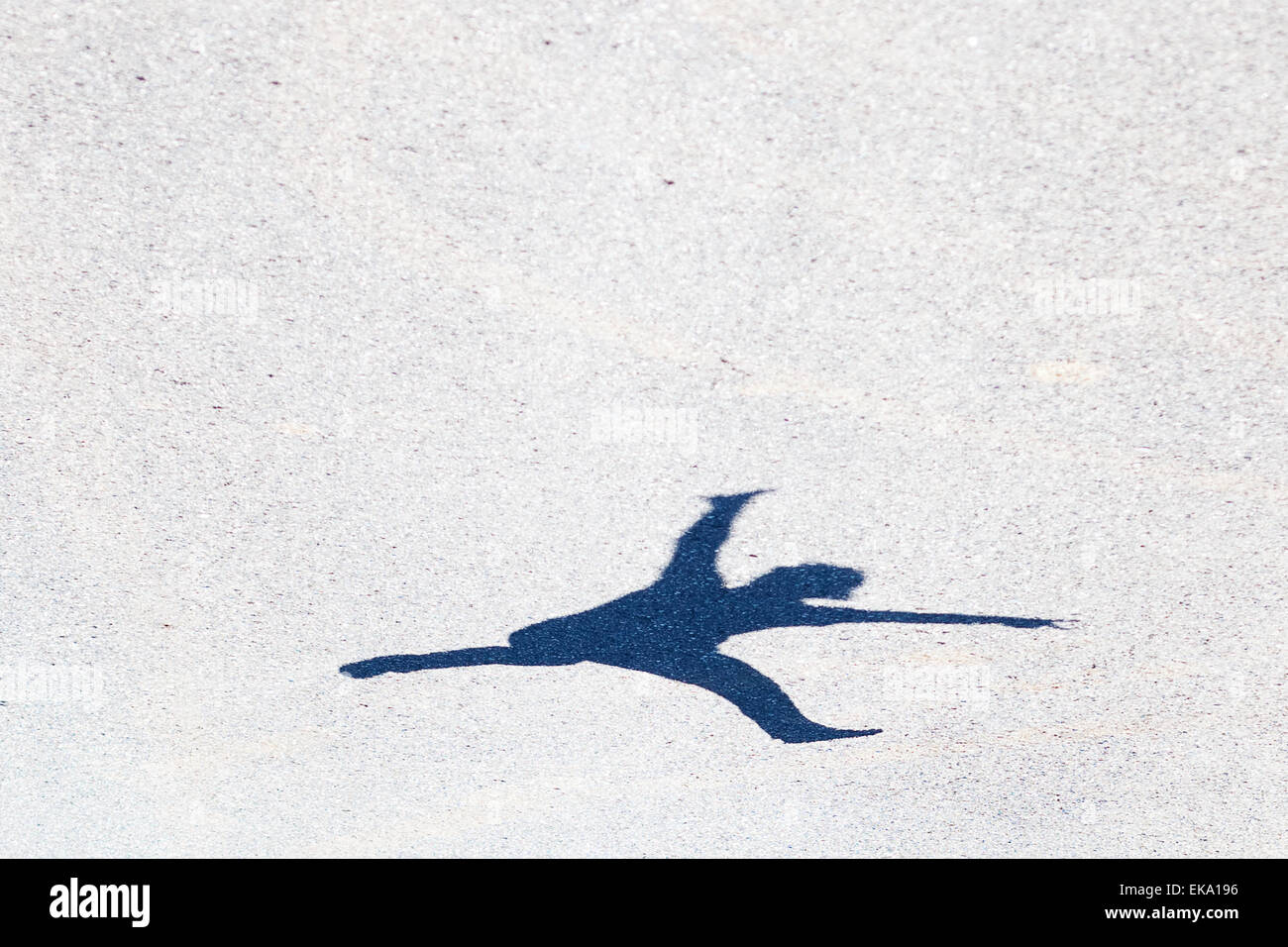 shadow of a man jumping on the asphalt Stock Photo - Alamy