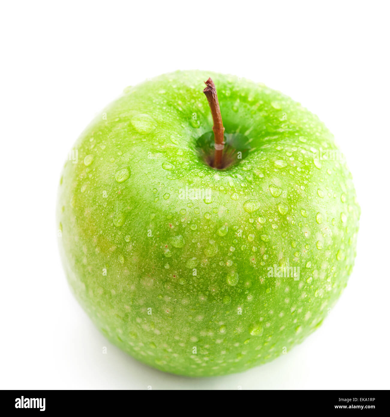 big green apple with water drops isolated on white Stock Photo - Alamy