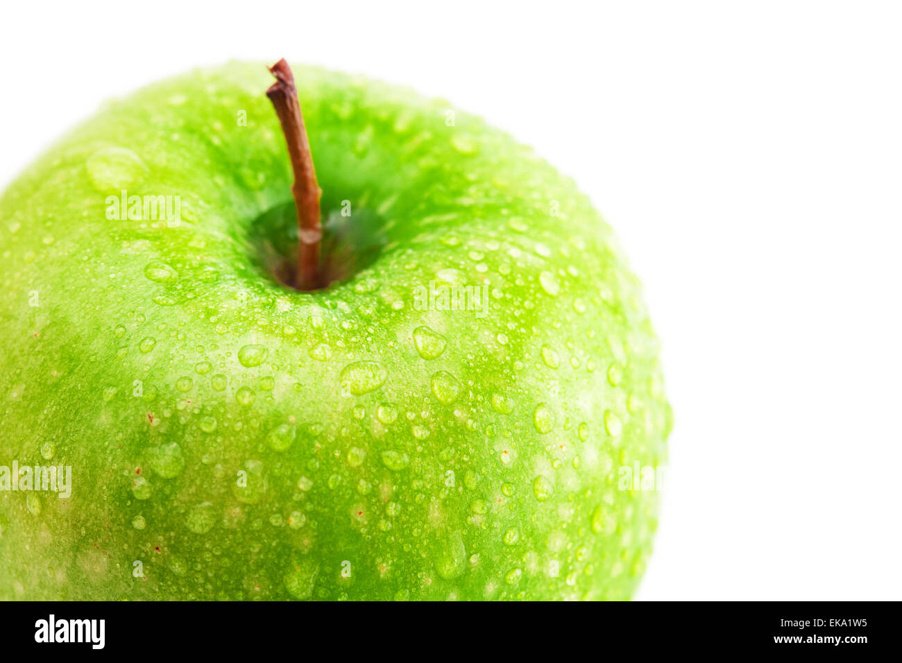big green apple with water drops isolated on white Stock Photo - Alamy