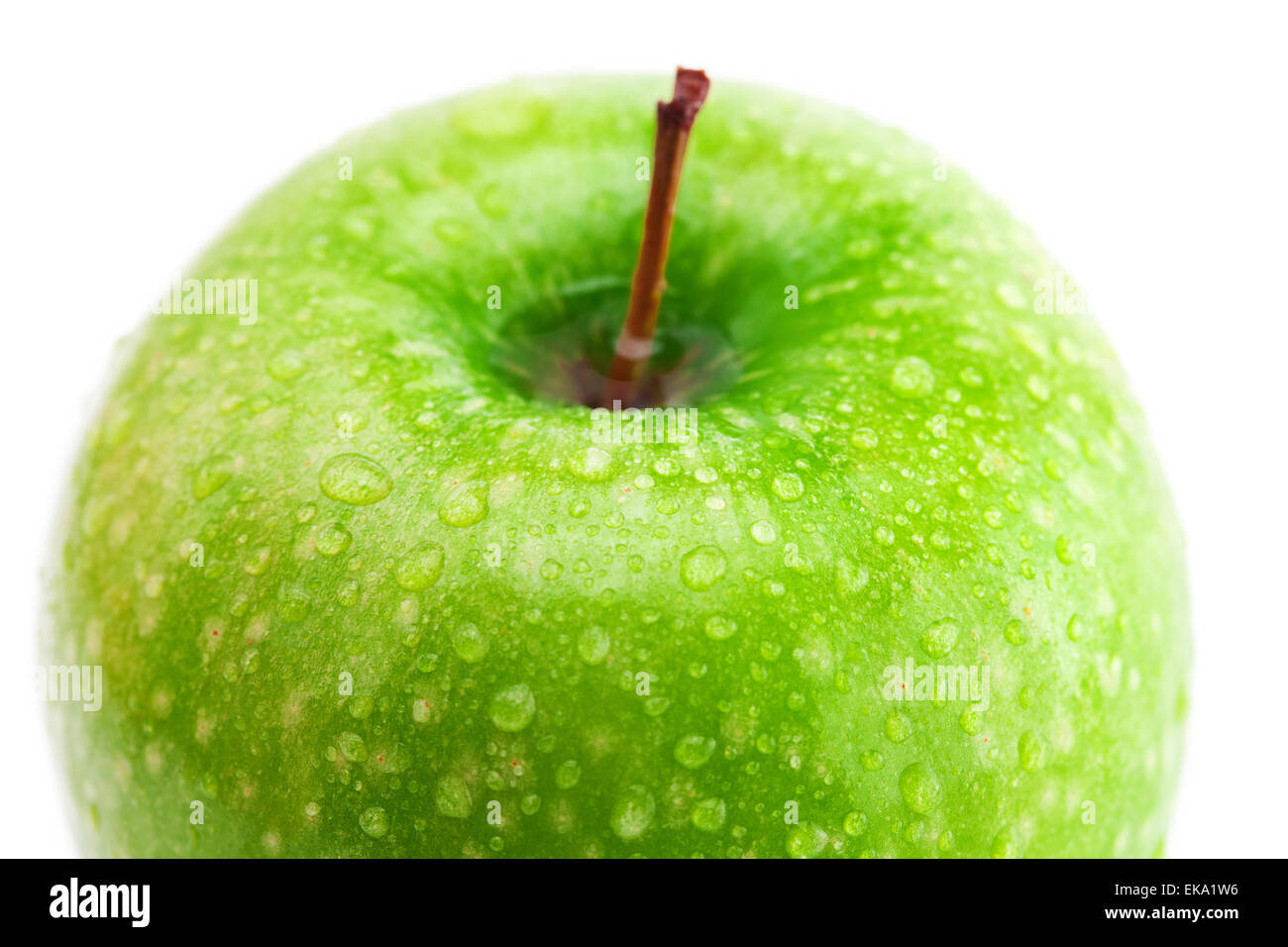 big green apple with water drops isolated on white Stock Photo - Alamy