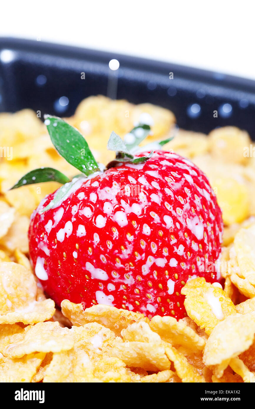 strawberry,milk and flakes in a bowl isolated on white Stock Photo - Alamy