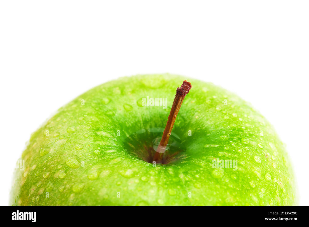 big green apple with water drops isolated on white Stock Photo - Alamy
