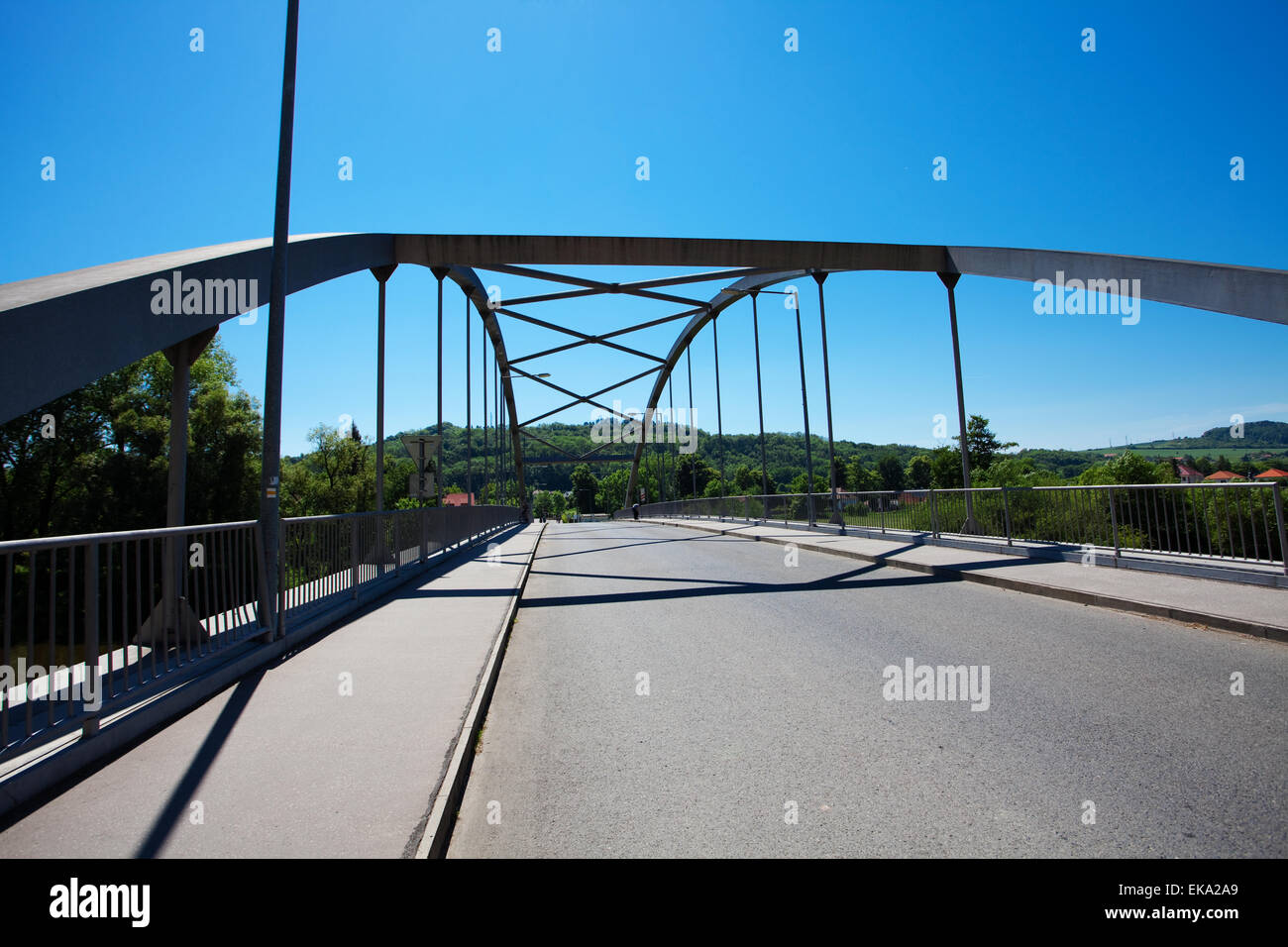 iron bridge construction against the blue sky Stock Photo - Alamy