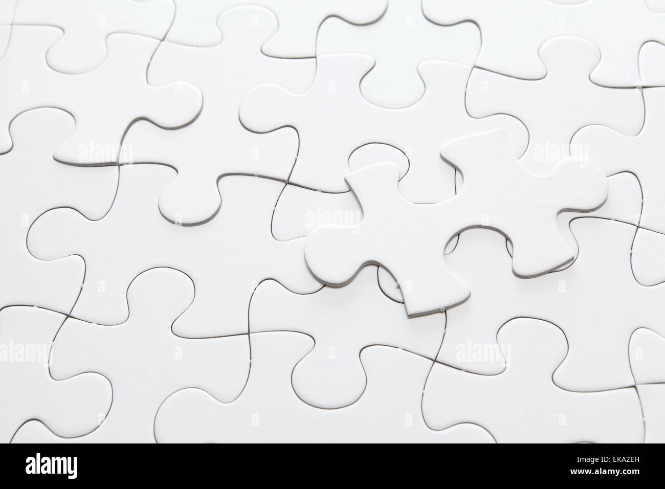 white jigsaw puzzle Stock Photo - Alamy