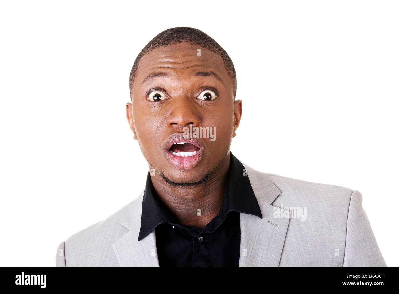 Young shocked businessman Stock Photo - Alamy