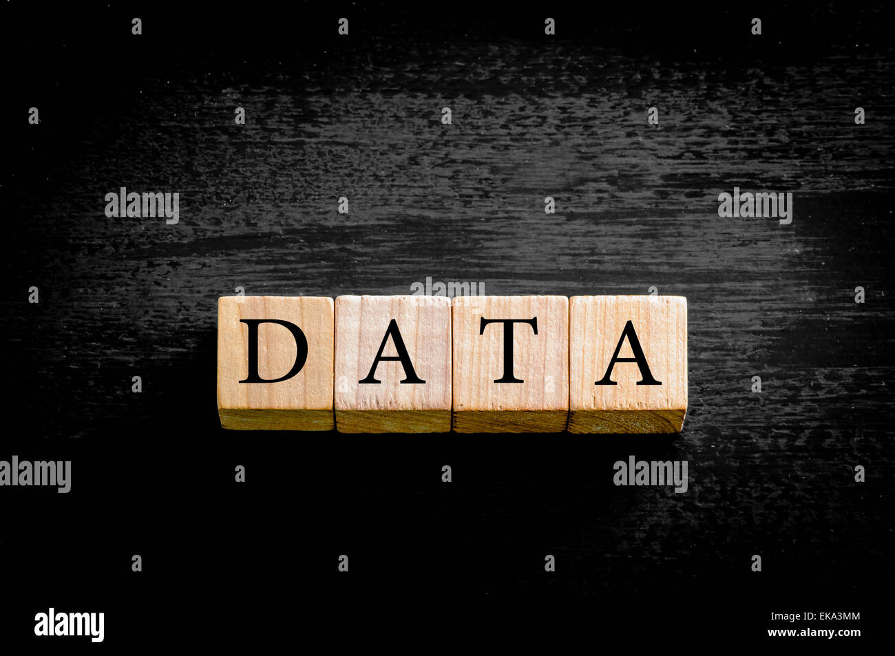 Word DATA. Wooden small cubes with letters isolated on black background ...