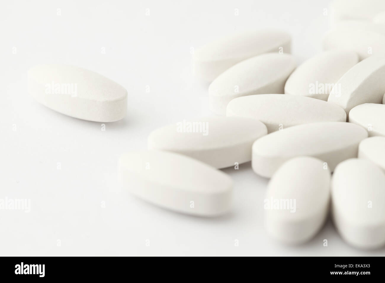 white medical tablets over white Stock Photo - Alamy