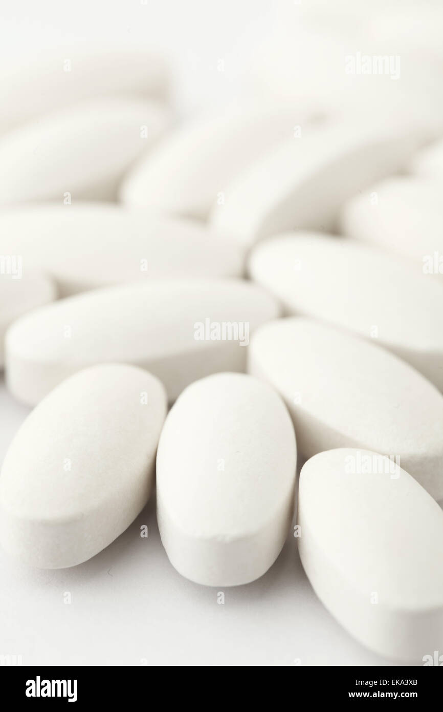 white medical tablets over white Stock Photo - Alamy