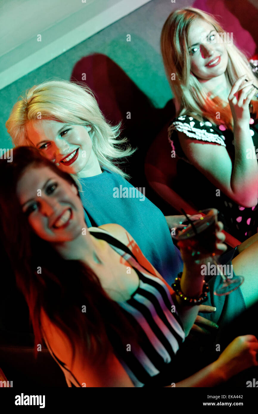 A group of friends having fun in a club Stock Photo - Alamy