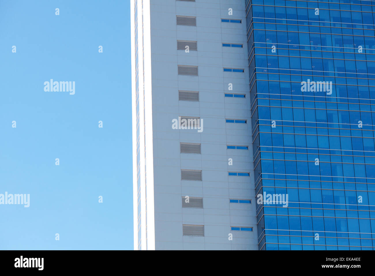 Beautiful modern office building against the blue sky Stock Photo - Alamy