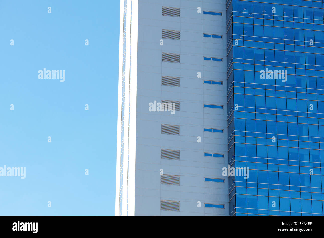 Beautiful modern office building against the blue sky Stock Photo - Alamy