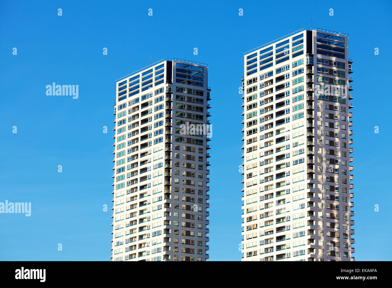 Beautiful modern office building against the blue sky Stock Photo - Alamy