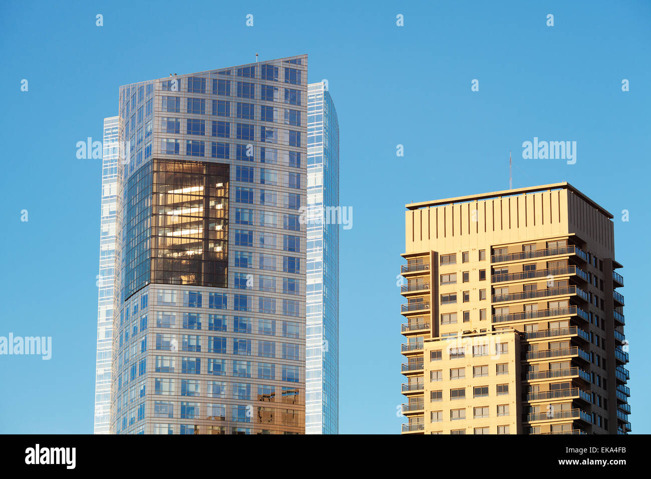 Beautiful modern office building against the blue sky Stock Photo - Alamy