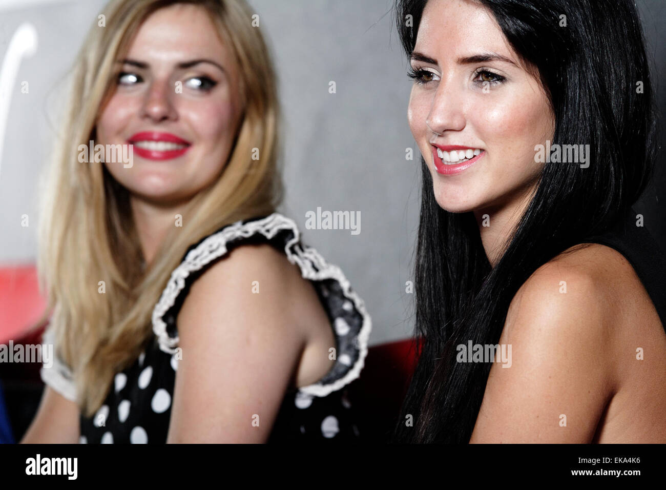 Two friends in a nightclub Stock Photo - Alamy