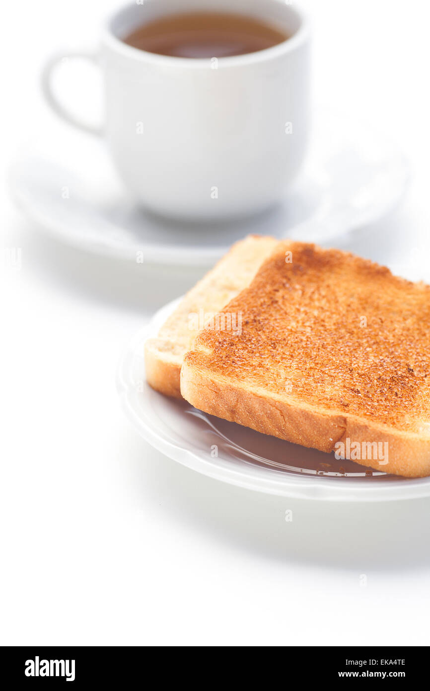tea and toast isolated on white Stock Photo - Alamy
