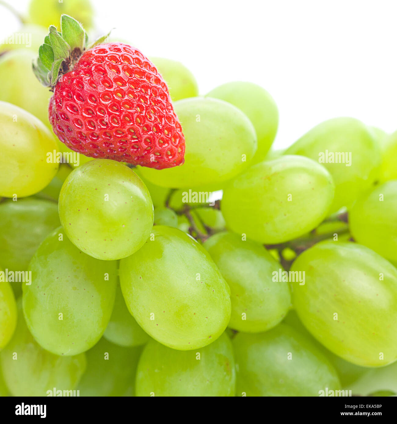 bunch of white grapes and strawberries Stock Photo - Alamy