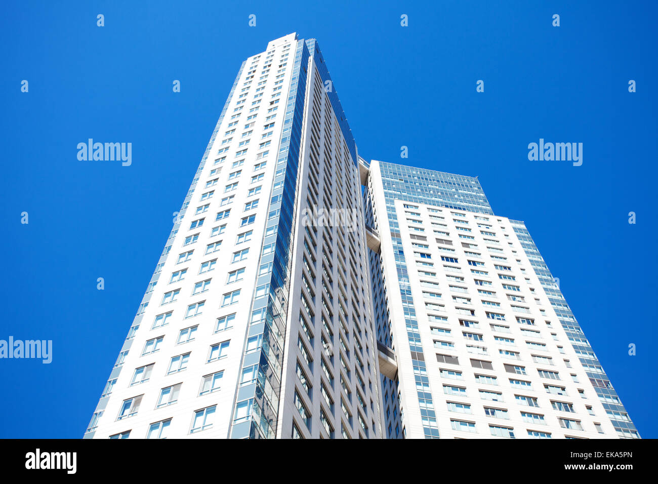 Beautiful modern office building against the blue sky Stock Photo - Alamy