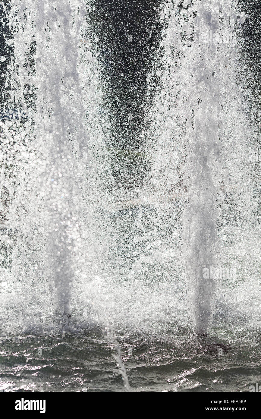 splashing water of fountain in sunlight Stock Photo - Alamy