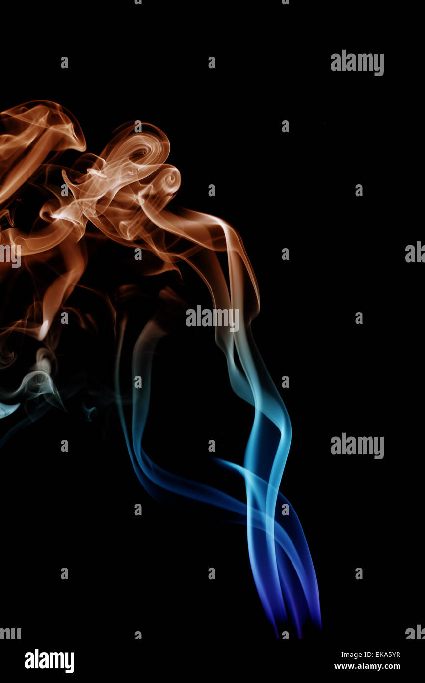 wave and smoke of different colors on black background Stock Photo - Alamy