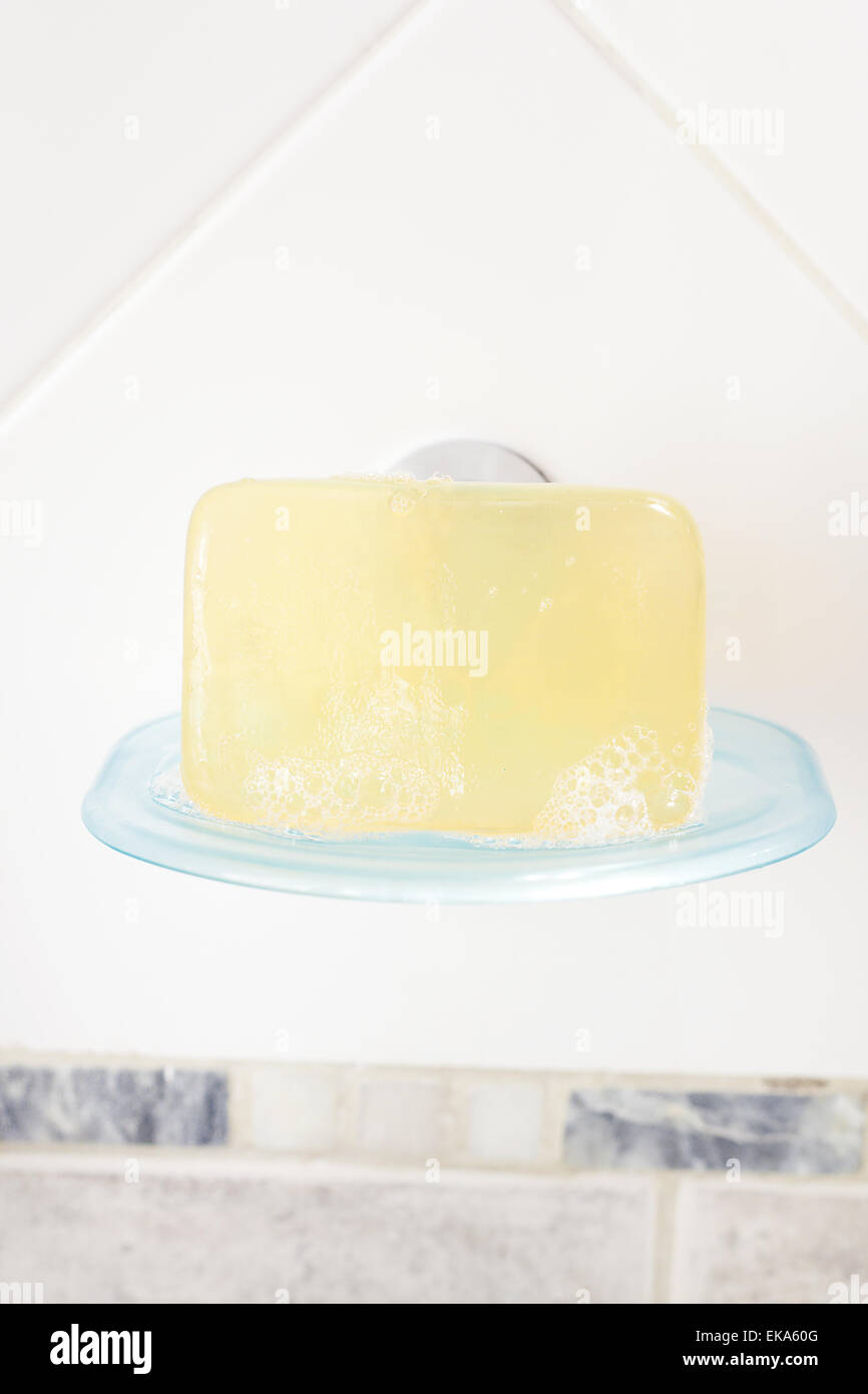 soap in the bathroom on the background tile Stock Photo - Alamy