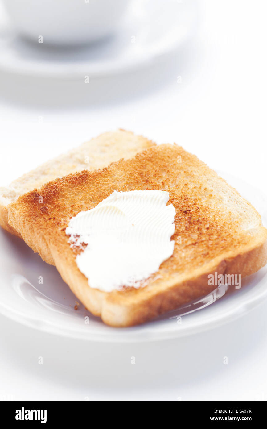 tea and toast with butter isolated on white Stock Photo - Alamy