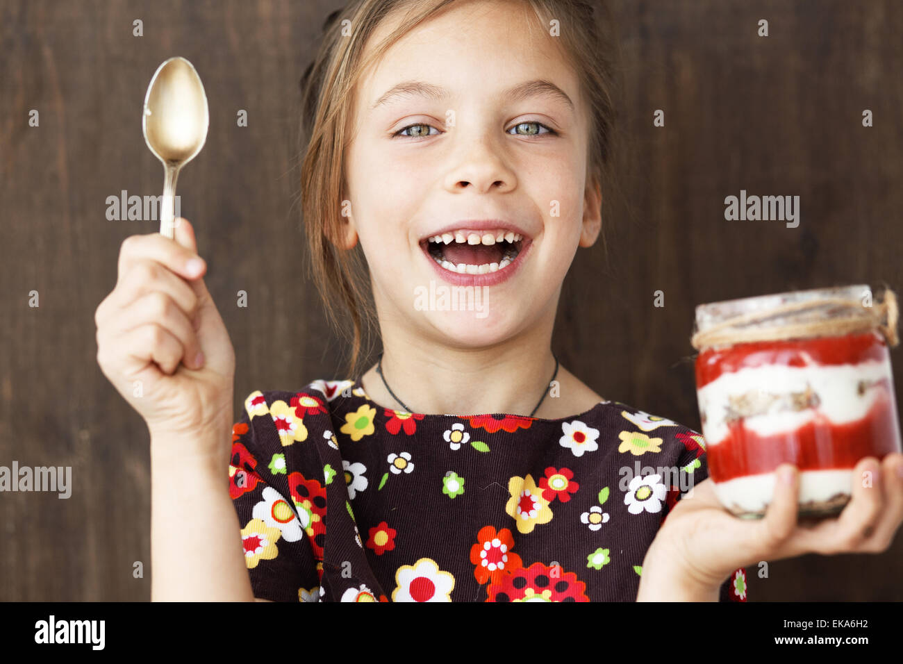 Child eating dessert Stock Photo - Alamy