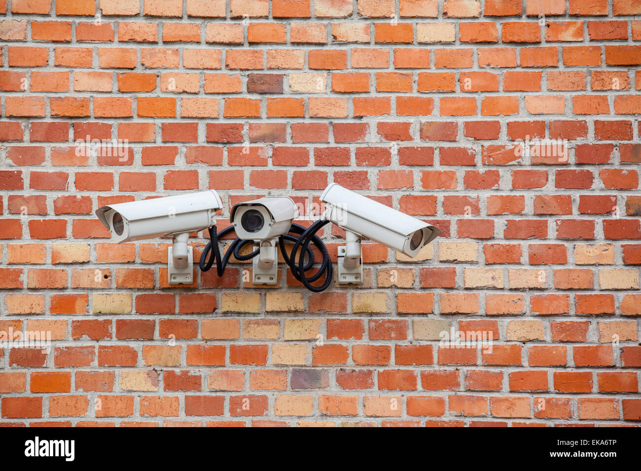 Security CCTV camera mounted on the building wall Stock Photo - Alamy