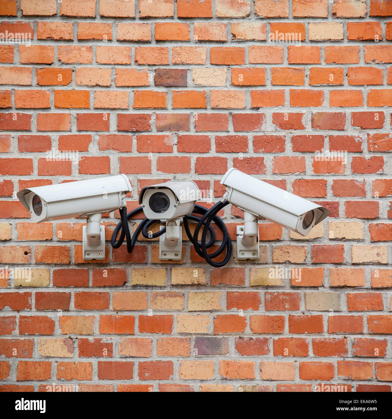 Security CCTV camera mounted on the building wall Stock Photo - Alamy