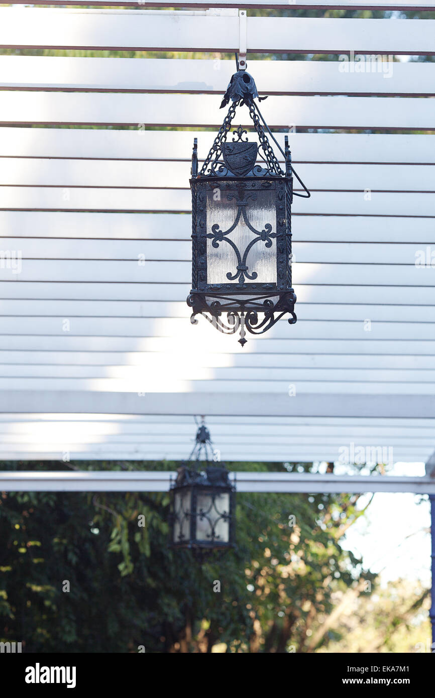decorative lantern hanging in the arbor Stock Photo - Alamy