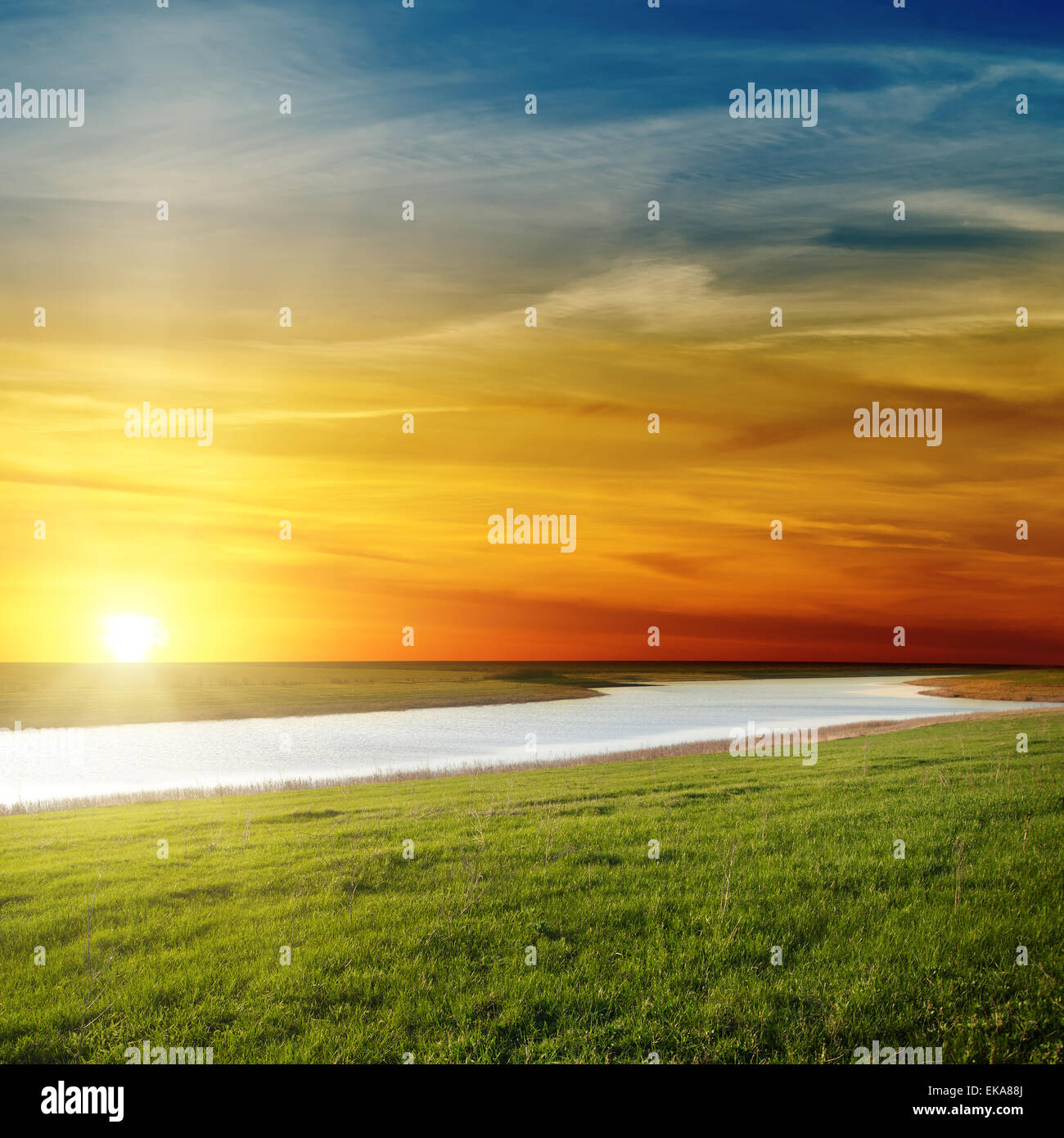 beautiful sunset over river Stock Photo - Alamy