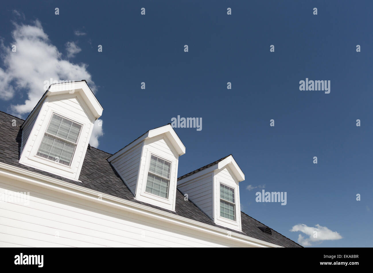 Roof of House and Windows Against Beautiful Deep Blue Sky Stock Photo ...