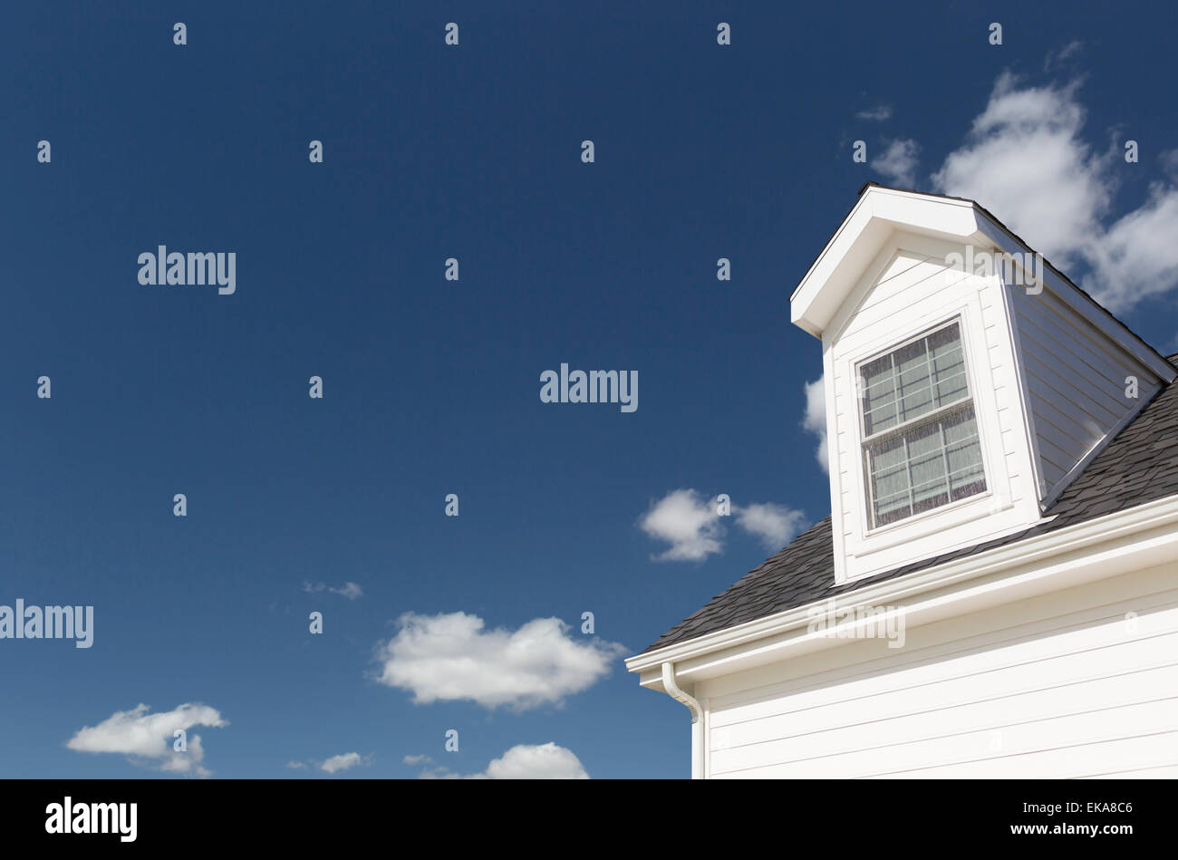 Roof of House and Windows Against Beautiful Deep Blue Sky Stock Photo ...