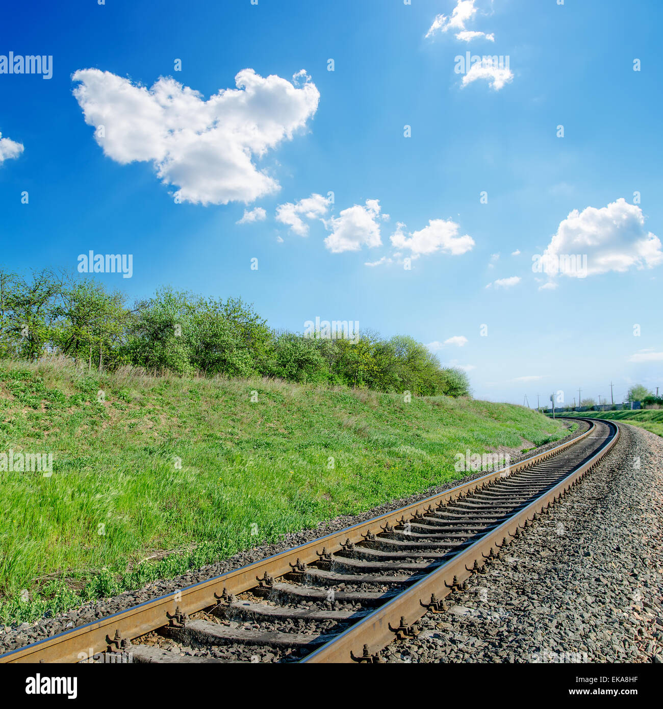railroad in green landscape Stock Photo - Alamy