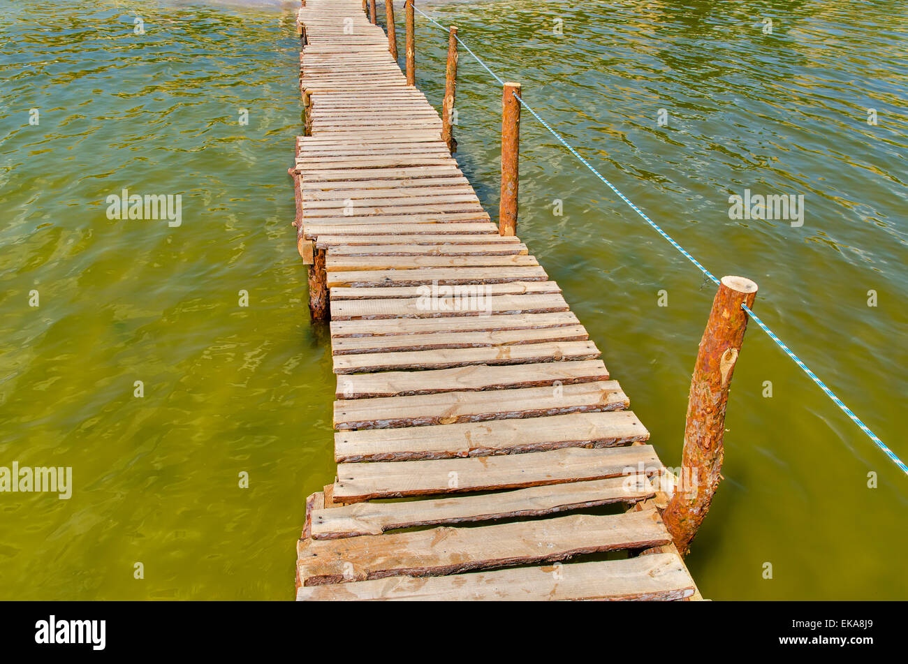 wooden bridge over water Stock Photo - Alamy