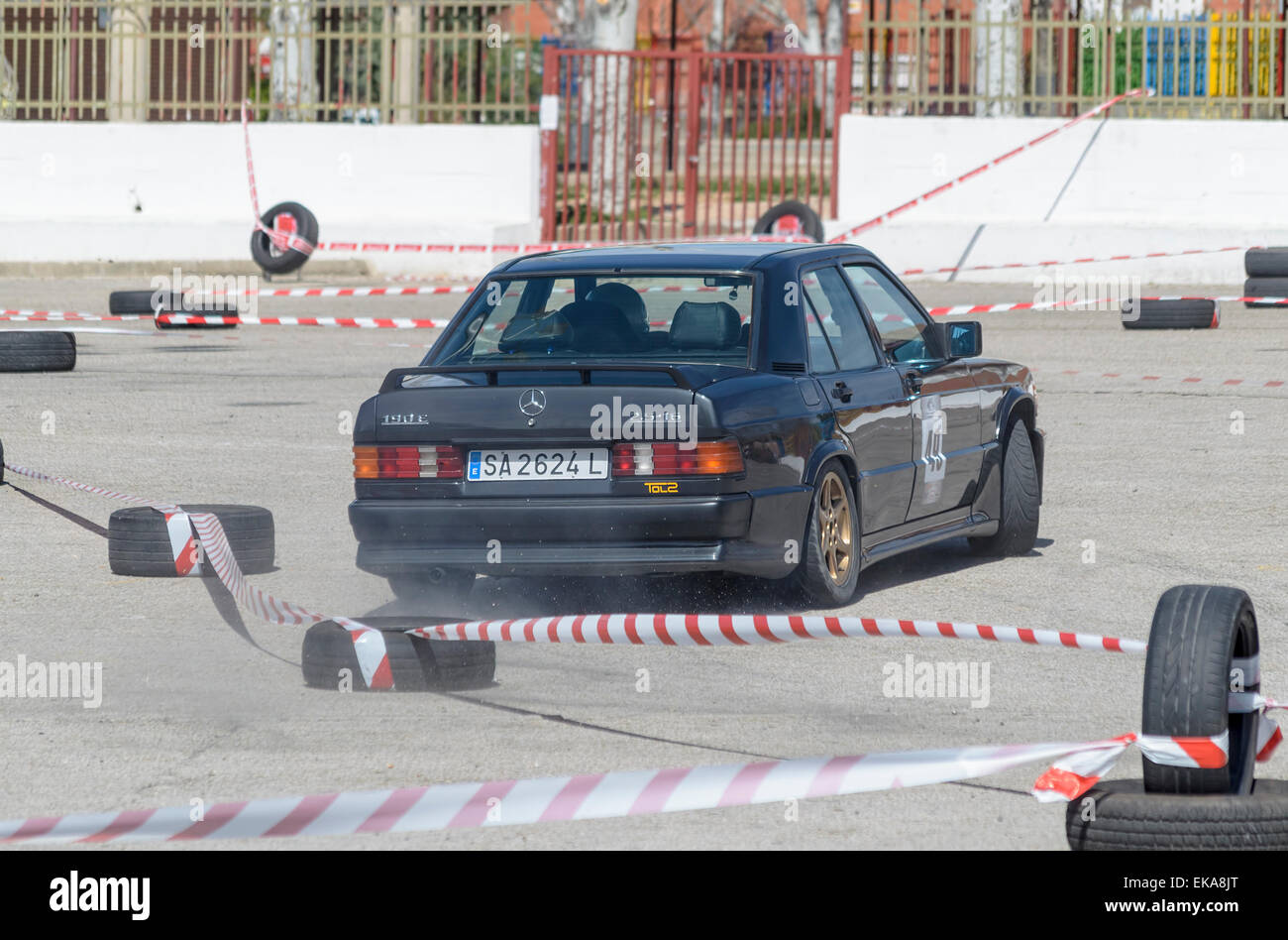 Car rally, of slalom, at public street. Juan Carlos Lopez Olmo with his ...