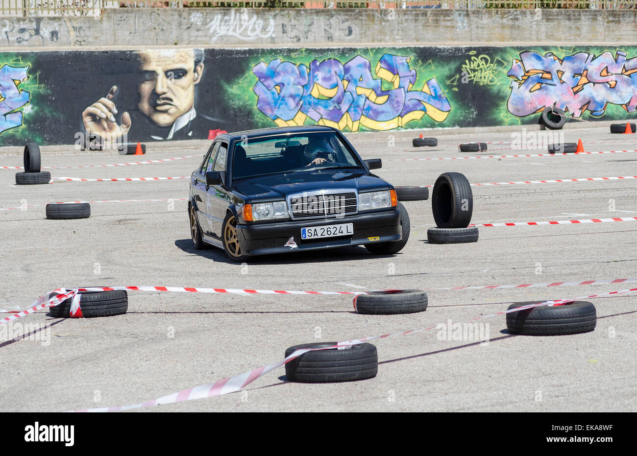 Car rally, of slalom, at public street. Juan Carlos Lopez Olmo with his ...