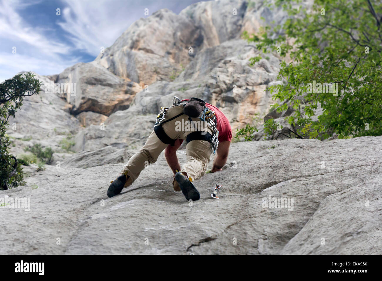 Rock climber climbing cliff in hi-res stock photography and images - Alamy