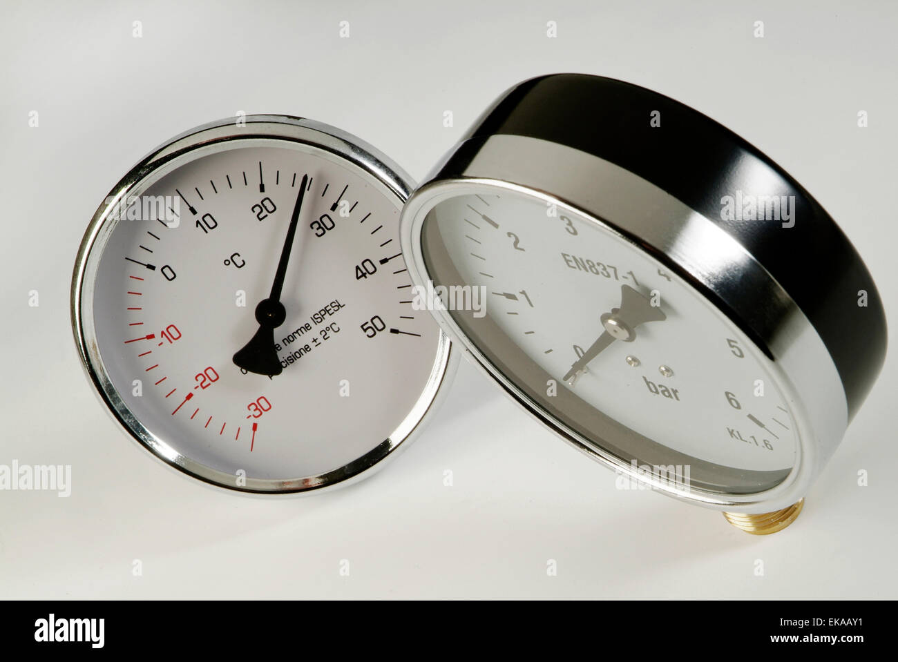 industrial thermometer and barometer on a white background Stock Photo ...