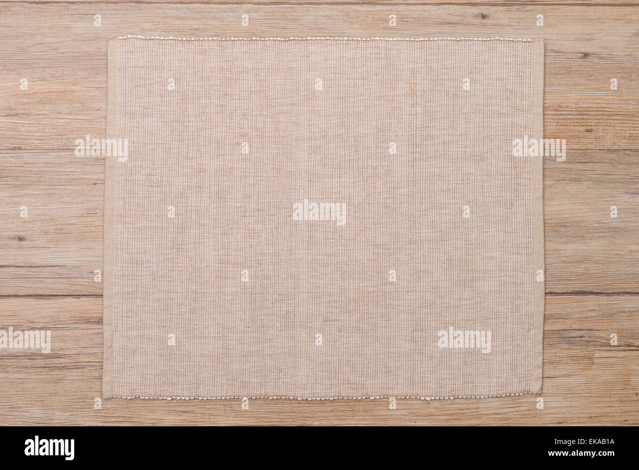 Place mat on wooden deck table Stock Photo - Alamy
