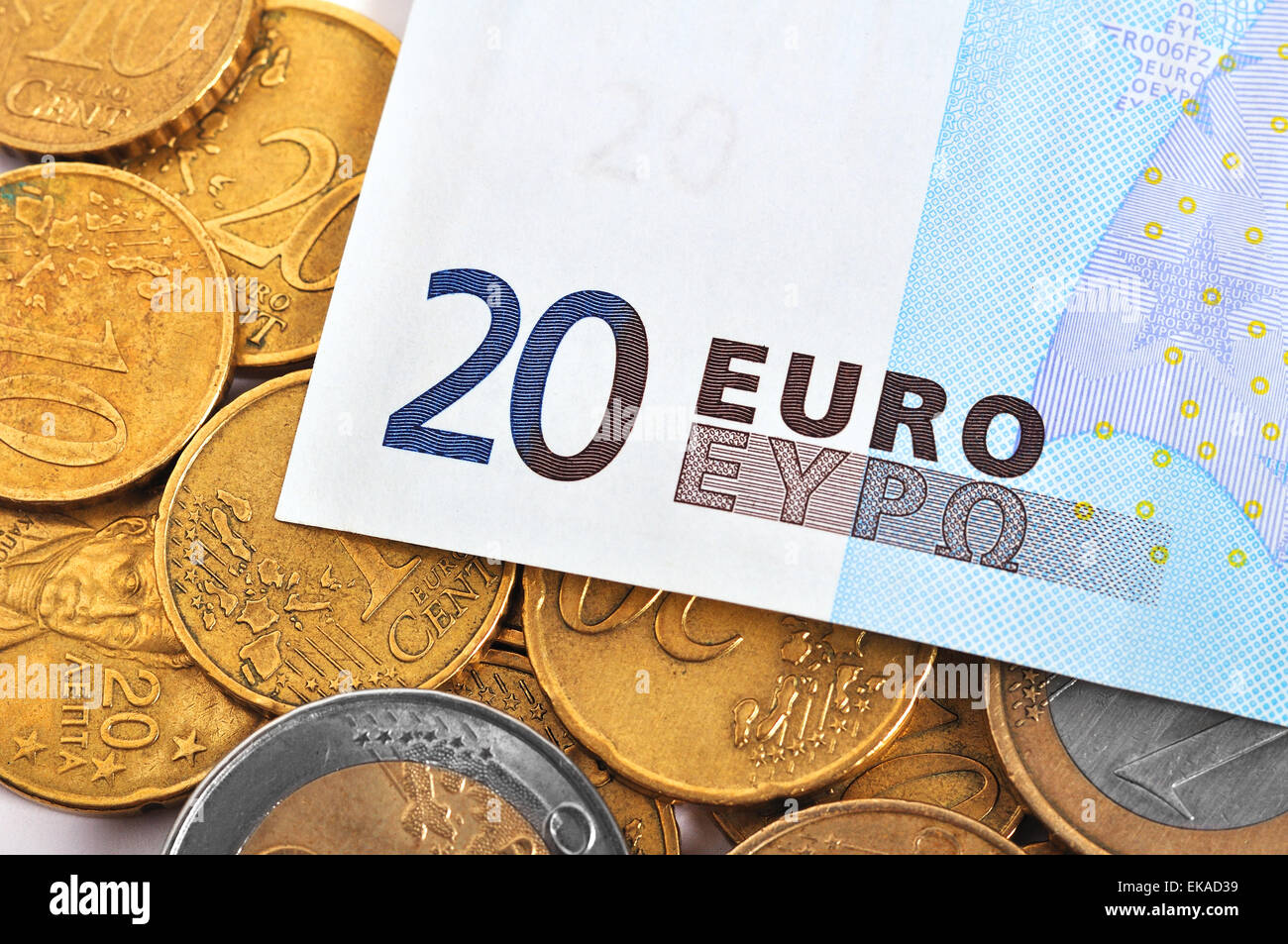 twenty euro bills and coins, close up Stock Photo - Alamy