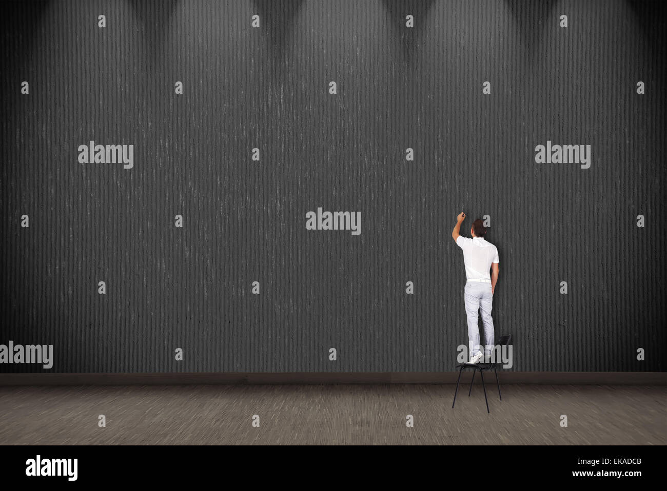 Stylish young man standing chair hi-res stock photography and images ...